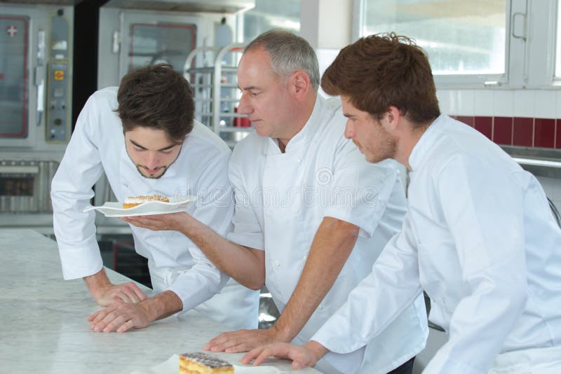 Chef Apprentice Smelling Dessert Stock Image - Image of sample, flavor ...