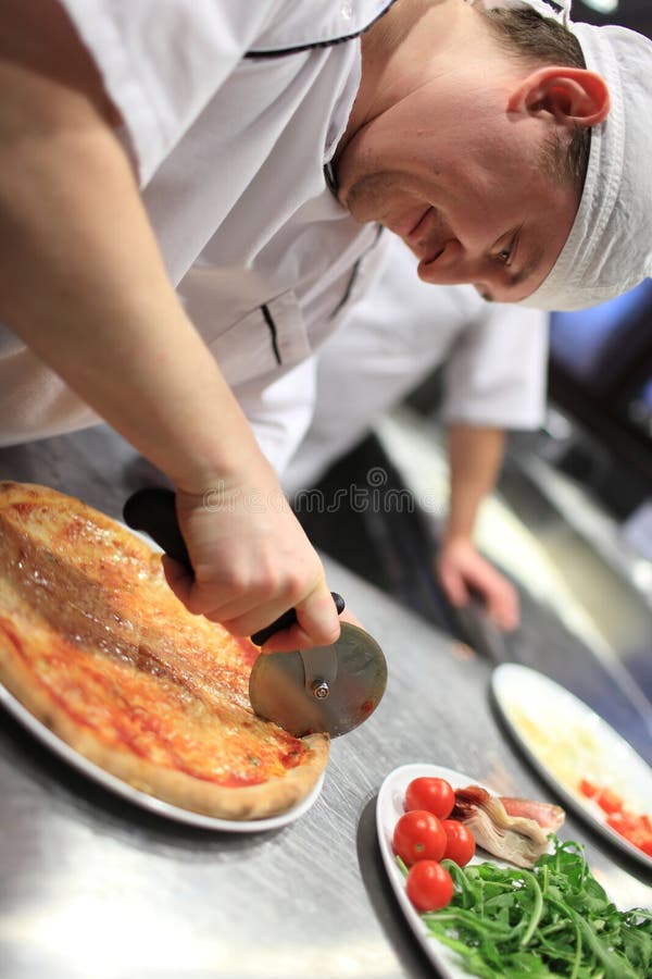 Chef Baker in White Uniform Making Pizza at Kitchen Stock Photo - Image ...