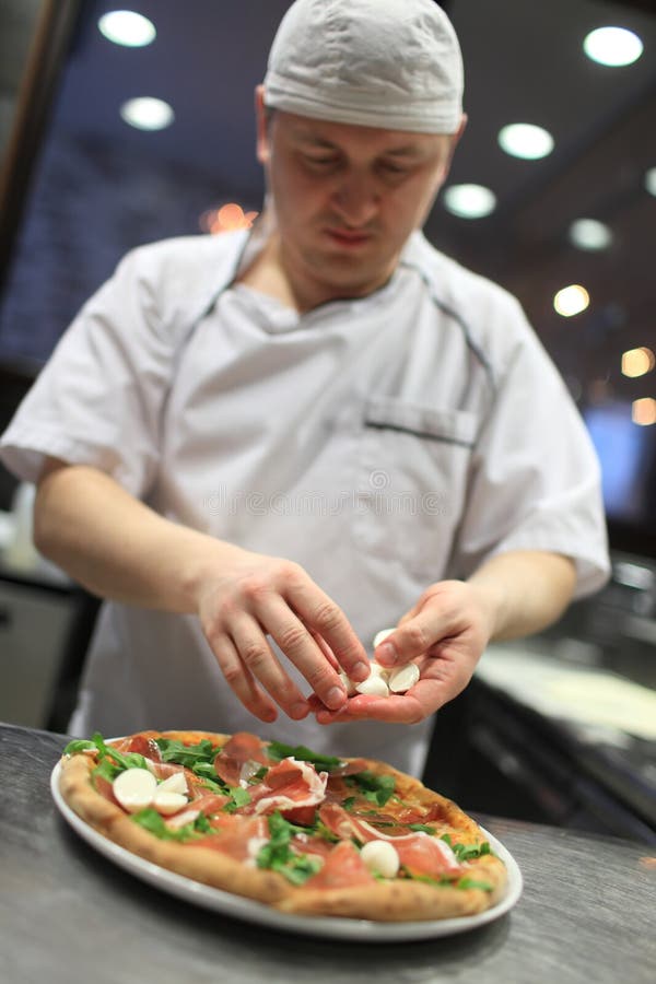 Chef Baker in White Uniform Making Pizza at Kitchen Stock Photo - Image ...