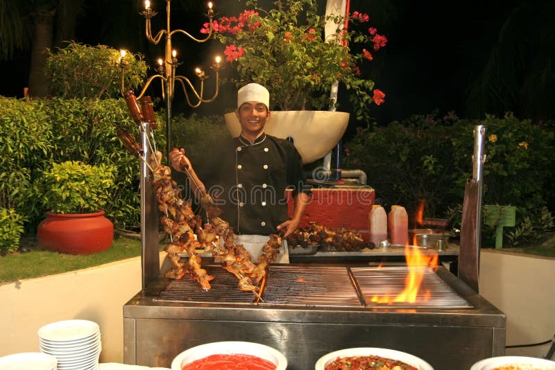 Chef at barbecue dinner stock image. Image of happy, food - 6805607