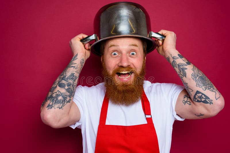 Happy Chef with Beard and Red Apron Plays with Pot Stock Photo - Image ...