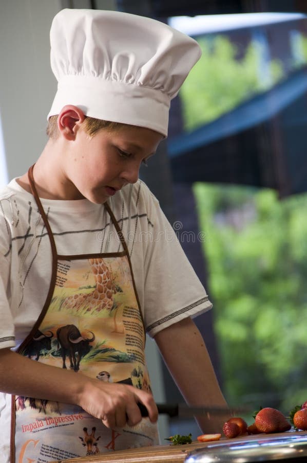 Chef Boy Chopping Strawberries Stock Image - Image of chopping, knife ...