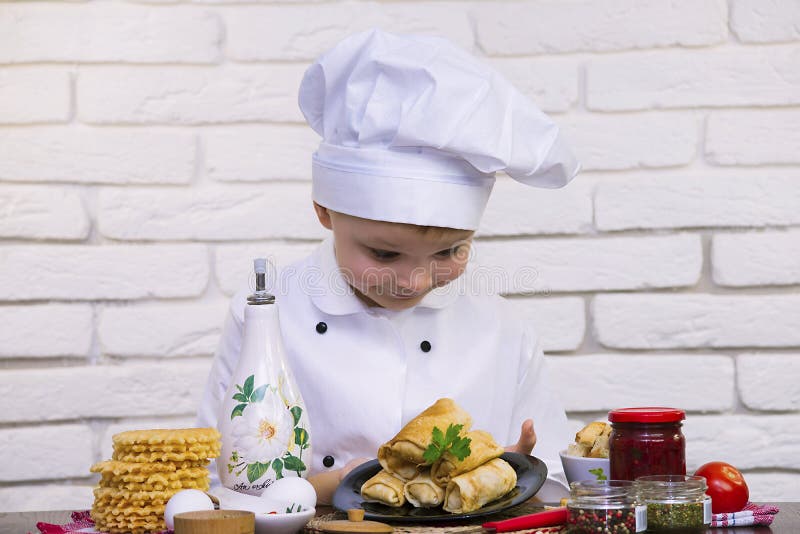 Chef Boy Cooked Pancakes with Meat on a Plate Stock Image - Image of ...