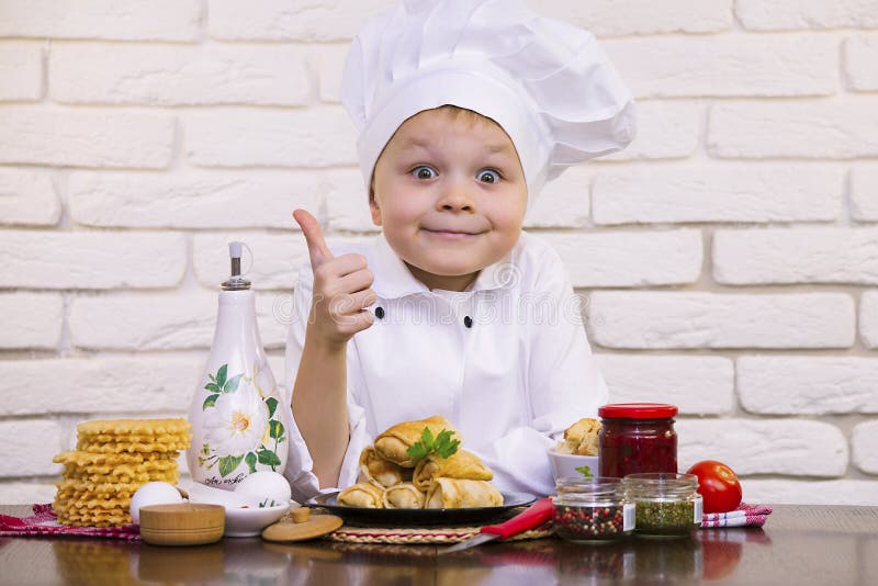 Chef Boy Cooked Pancakes with Meat on a Plate Stock Image - Image of ...