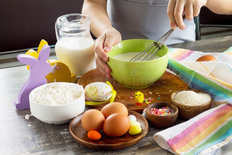 Chef Boy Cooking on a Easter Kitchen Table and Cooking Dough. Stock ...