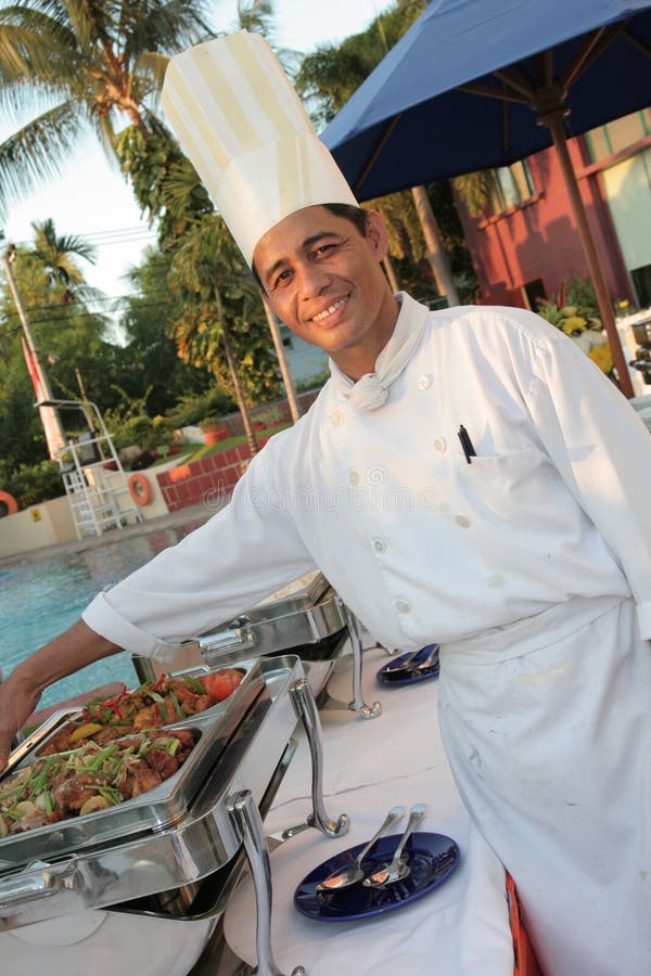 Chef at buffet stock image. Image of dishes, plates, male - 6507971