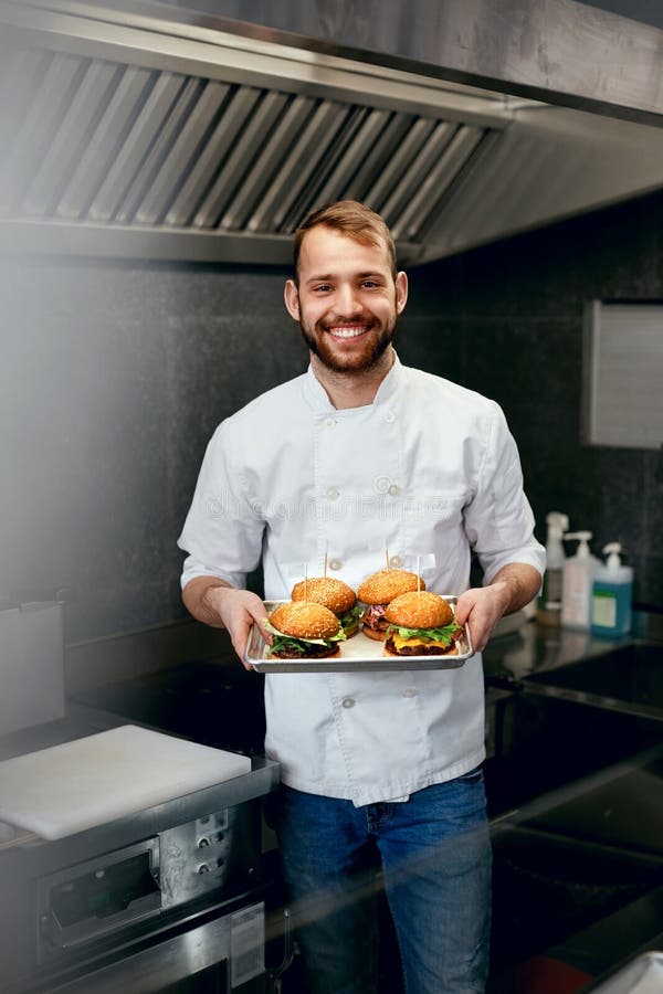 Chef Cooking Burgers in Kitchen Stock Photo - Image of burgers ...