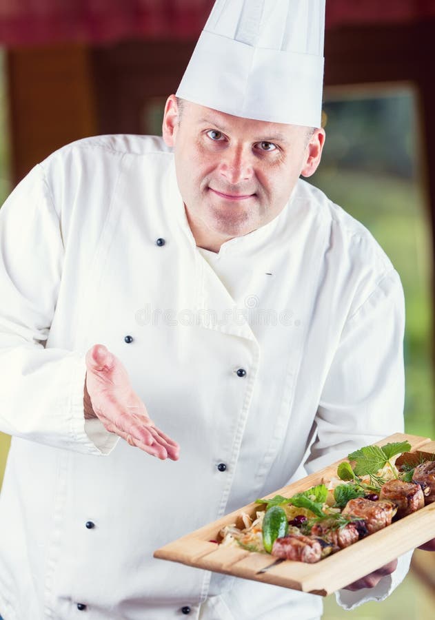 Chef. Chef Cooking.Chef Decorating Dish. Chef Preparing a Meal Stock ...