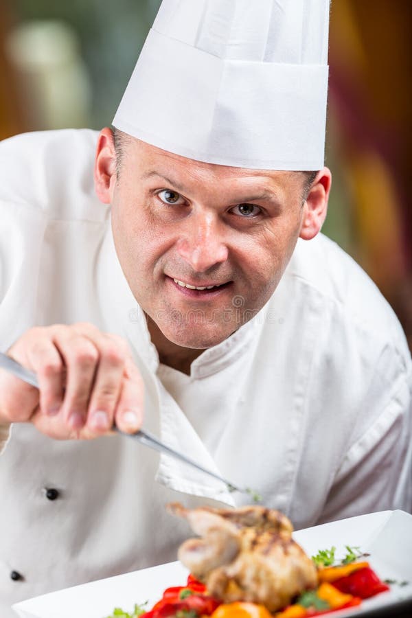 Chef. Chef Cooking.Chef Decorating Dish. Chef Preparing a Meal Stock ...