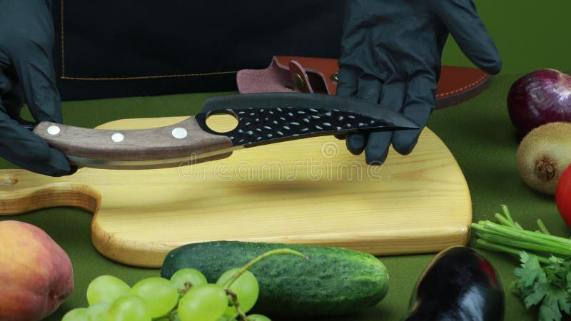 The Chef Chooses a Knife. the Chef Demonstrates a Sharp Chopping ...