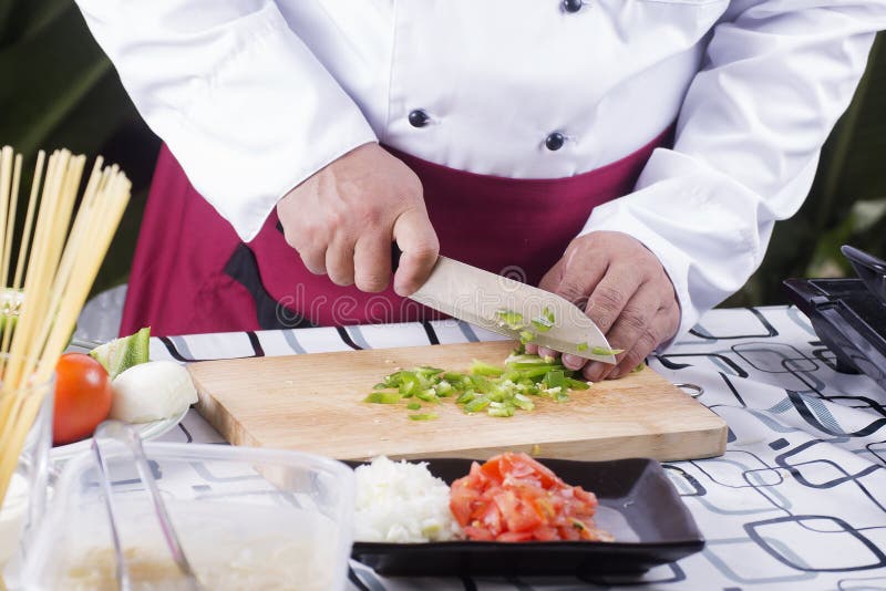 Chef Chopping Green Bell Pepper with Knife before Cooking Stock Photo ...