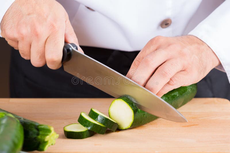 Chef chopping vegetables stock image. Image of cooking - 79234793