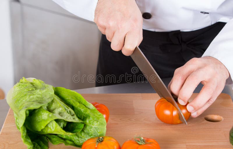 Chef chopping vegetables stock photo. Image of pepper - 68837288