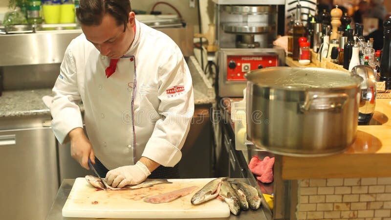 Chef is Cleaning Italian Fish Sardines in a Restaurant Kitchen Stock ...