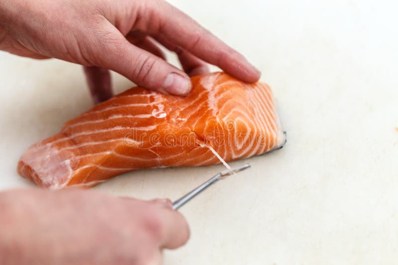 Chef cleaning salmon stock image. Image of hand, food - 89974117
