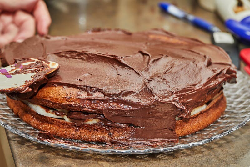 Chef Coats the Cake with Chocolate Ganache To Make Chocolate Cake with ...