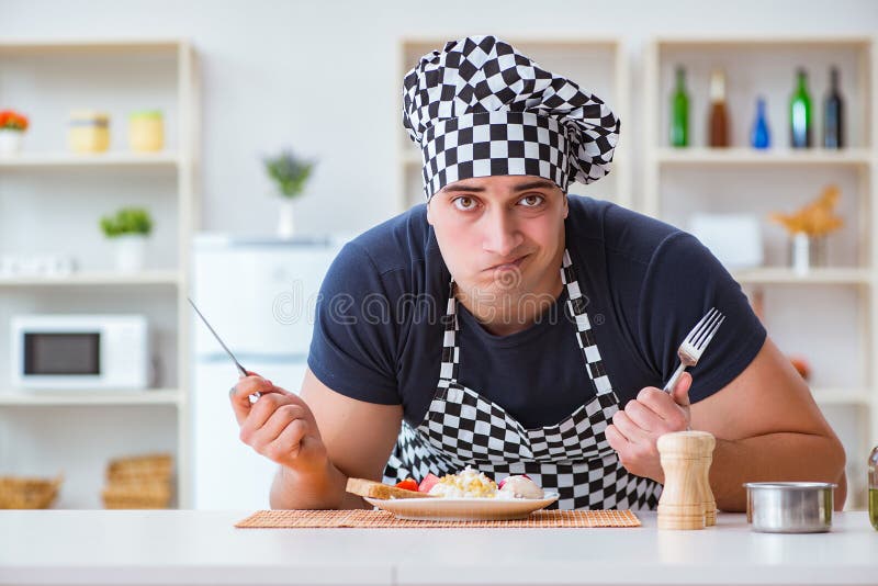 The Chef Cook Cooking a Meal Breakfast Dinner in the Kitchen Stock ...