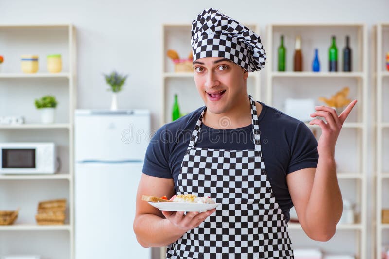 The Chef Cook Cooking a Meal Breakfast Dinner in the Kitchen Stock ...