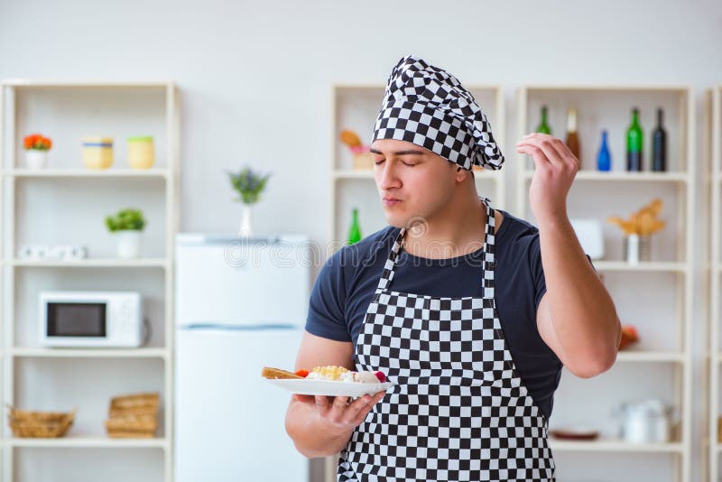 The Chef Cook Cooking a Meal Breakfast Dinner in the Kitchen Stock ...