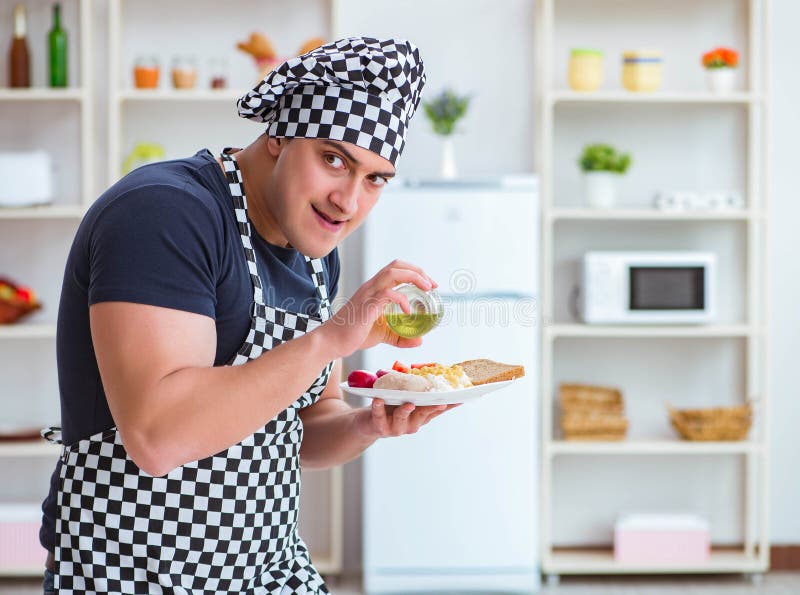 The Chef Cook Cooking a Meal Breakfast Dinner in the Kitchen Stock ...