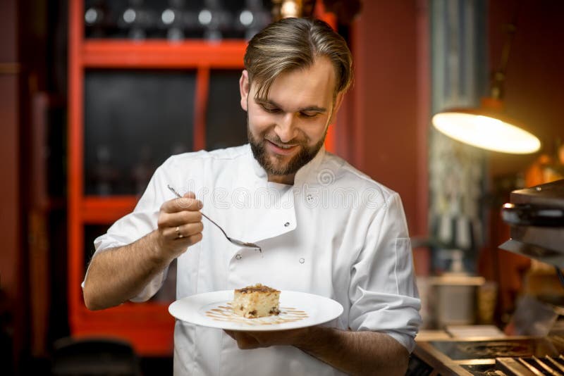 Chef Cook Decorating Cheesecake with Chocolate Powder Stock Image ...