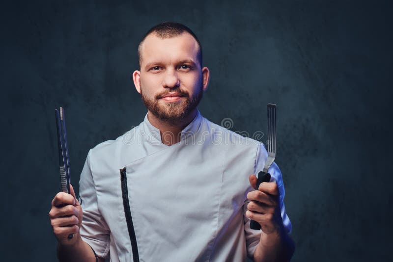 Man Cook Holds a Pan with Vegetables Flying in the Air. Stock Photo ...