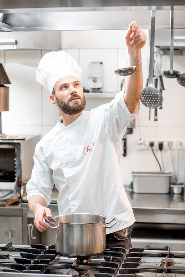 Chef cook at the kitchen stock image. Image of equipped - 86223191