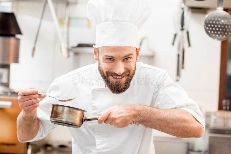 Chef cook at the kitchen stock photo. Image of kitchen - 86222912