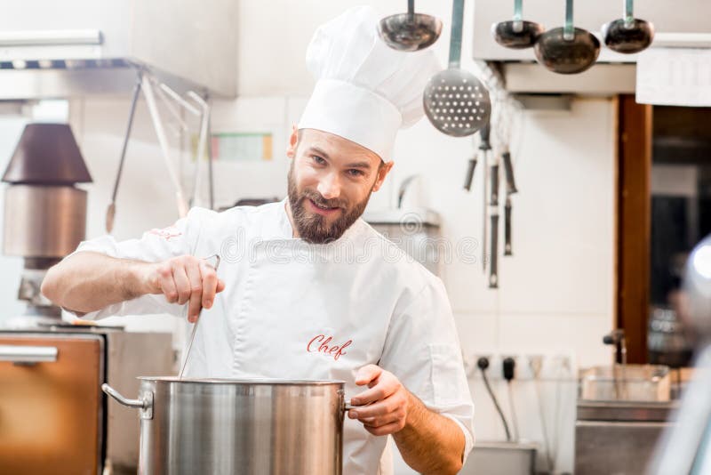 Chef cook at the kitchen stock image. Image of male, cooking - 86222987