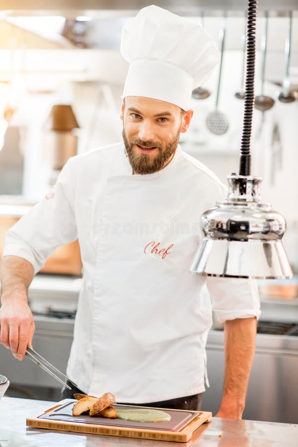 Chef cook at the kitchen stock image. Image of chef, cooking - 86222867