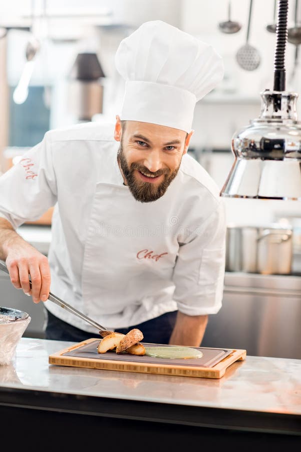 Chef cook at the kitchen stock photo. Image of chef, kitchen - 86223094