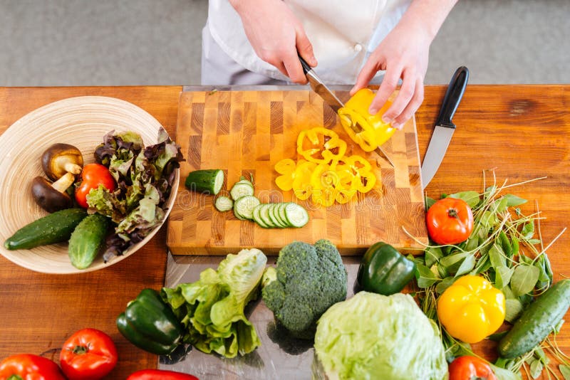 Chef Cook Making Slald and Cutting Fresh Vegetables on Table Stock ...