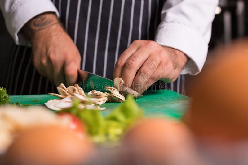 Chef Cook Preparing Vegetables in His Kitchen.Chef Cook Preparing ...