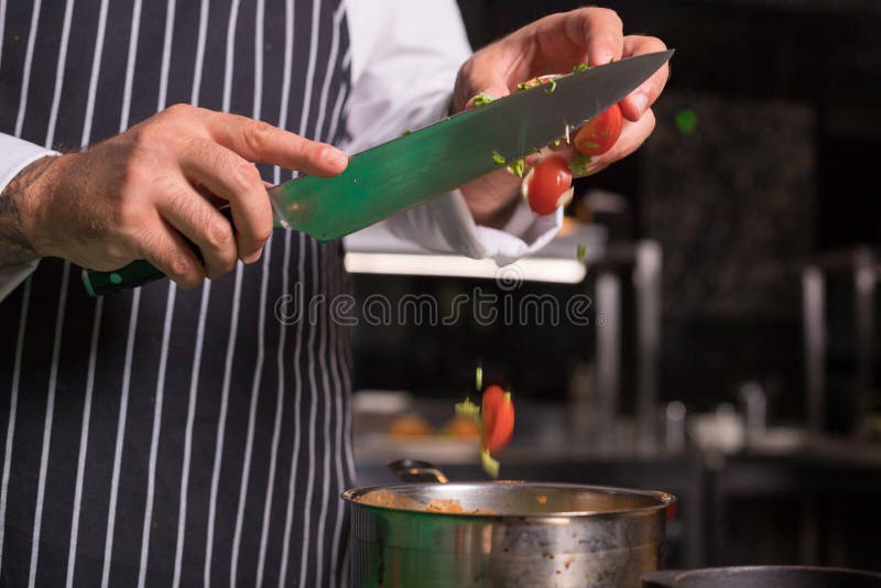 Chef Cook Preparing Vegetables in His Kitchen.Chef Cook Preparing ...