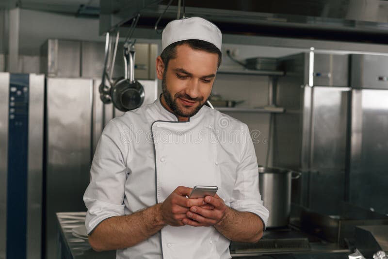 Smiling Chef Using Smart Technology Cooking Kitchen Stock Photos - Free ...