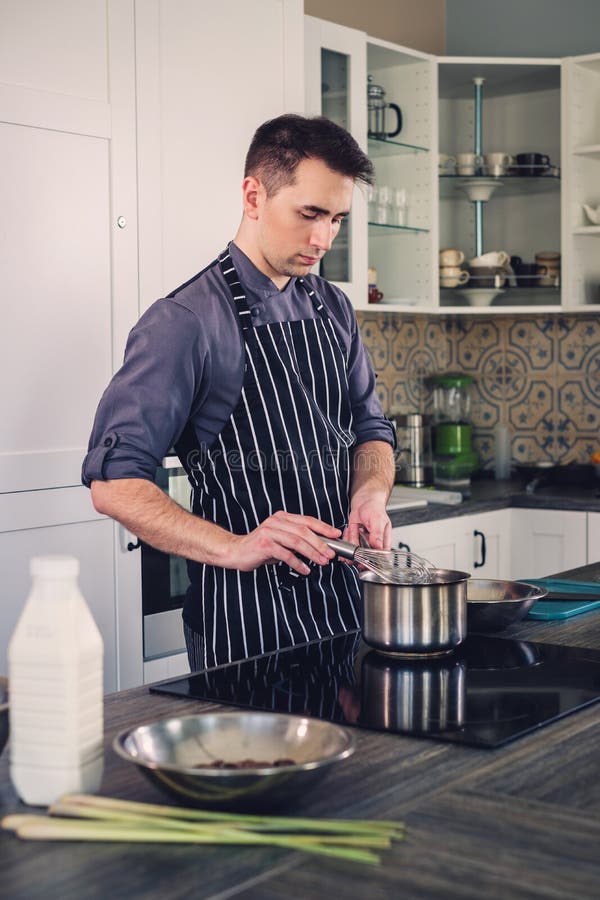 Chef Cook Working on a Modern Kitchen at Home Stock Photo - Image of ...
