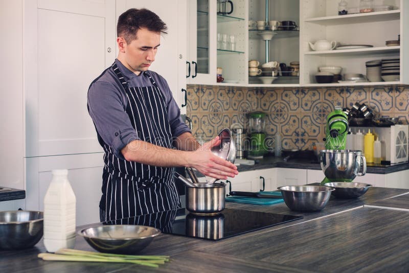 Chef Cook Working on a Modern Kitchen at Home Stock Photo - Image of ...