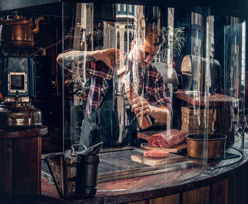 Chef Cooking Beef Steak on a Kitchen. Stock Photo - Image of hipster ...