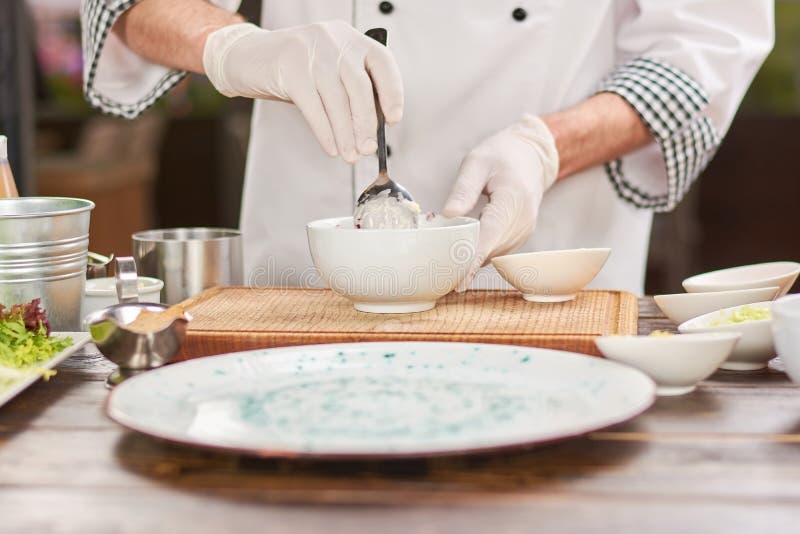 Chef Cooking a Dish at Kitchen. Stock Image - Image of decoration, menu ...
