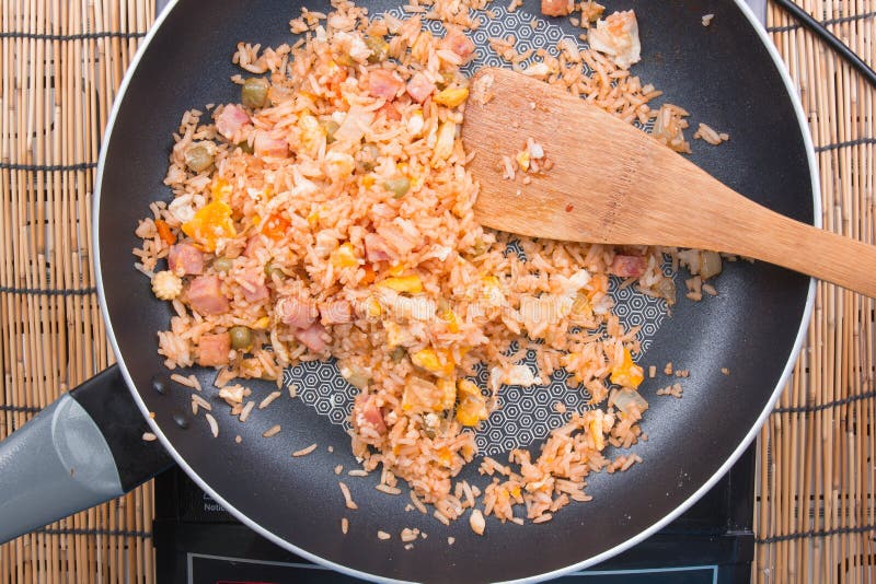 Chef cooking fried rice stock image. Image of bacon, corn - 75957441