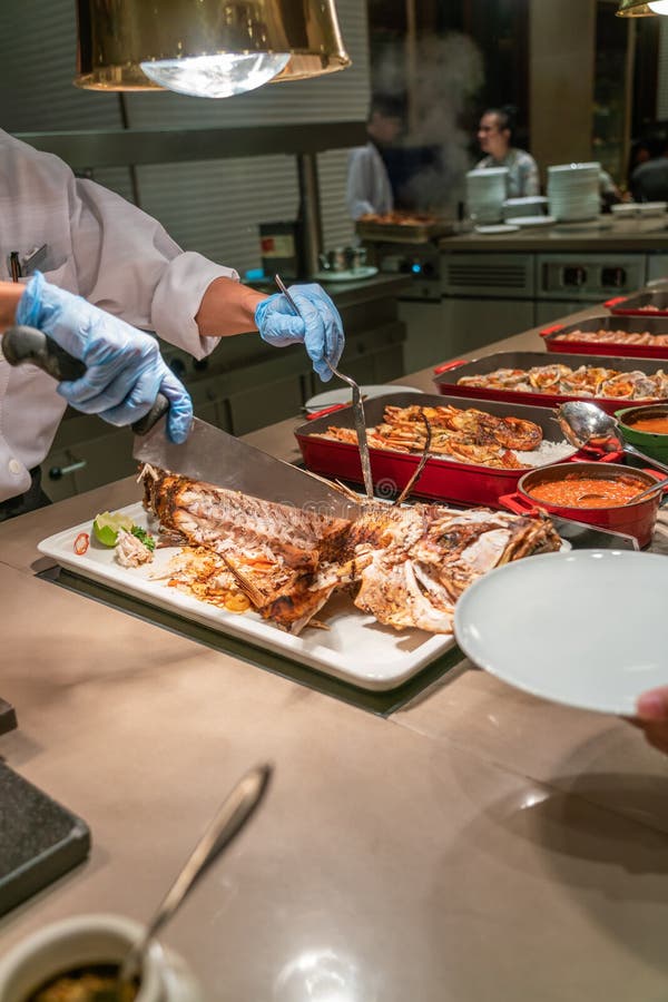 BBQ Buffet Chef Grilling Assorted Seafood on Big Pan Stock Photo ...