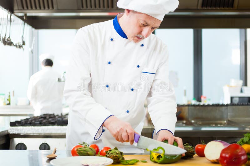 Chef Cooking in His Kitchen Stock Image - Image of smiling, cheerful ...