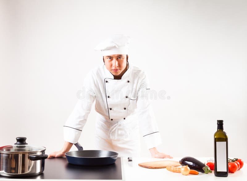 Chef Cooking in His Kitchen Stock Photo - Image of uniform, cook: 84844928