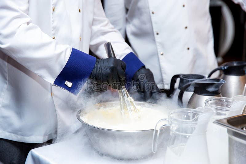 Chef is Cooking Ice Cream with Liquid Nitrogen Stock Photo - Image of ...