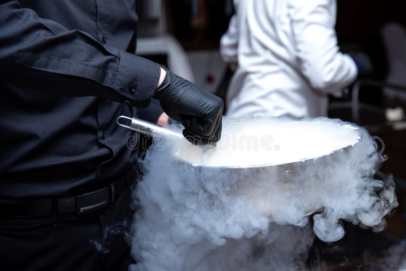 Chef is Cooking Ice Cream with Liquid Nitrogen Stock Photo - Image of ...
