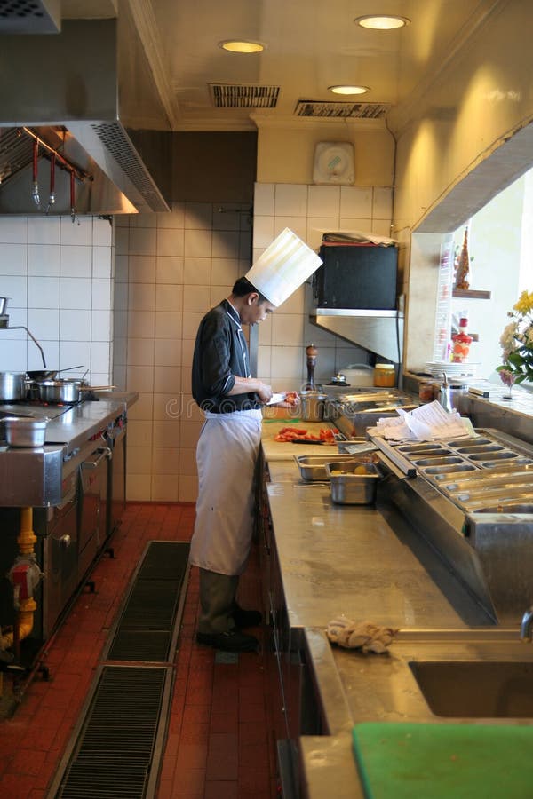 Chef cooking in kitchen stock photo. Image of industry - 6014780