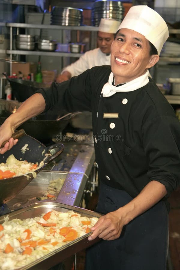 Chef cooking in kitchen stock photo. Image of work, accommodation - 6032024