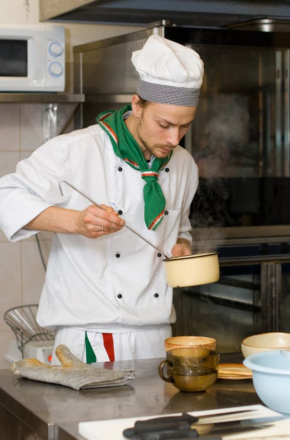 Chef cooking at kitchen stock image. Image of mature, culinairy - 7697119