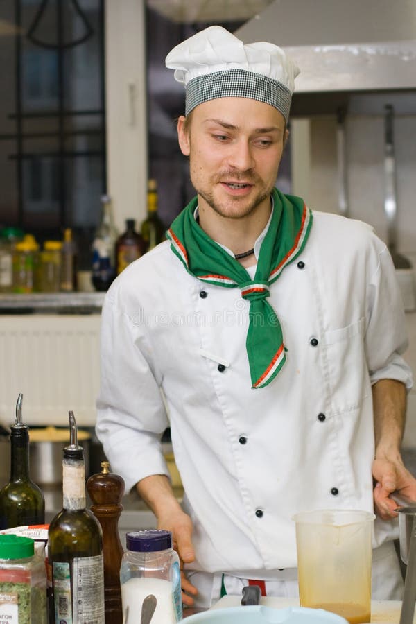 Chef cooking at kitchen stock photo. Image of cook, happy - 7697348