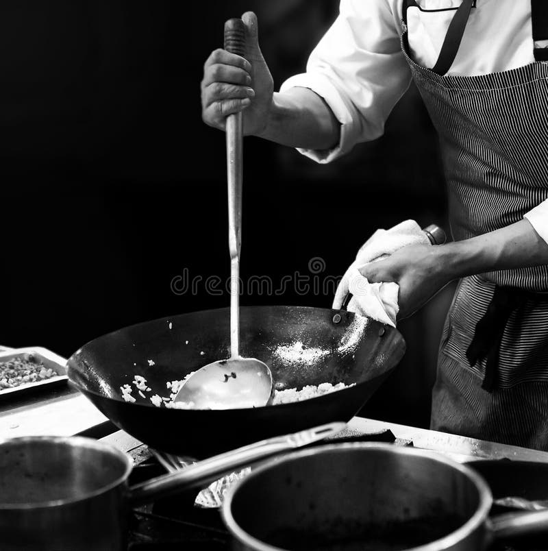 Chef Cooking in a Kitchen, Chef at Work, Black & White Stock Image ...